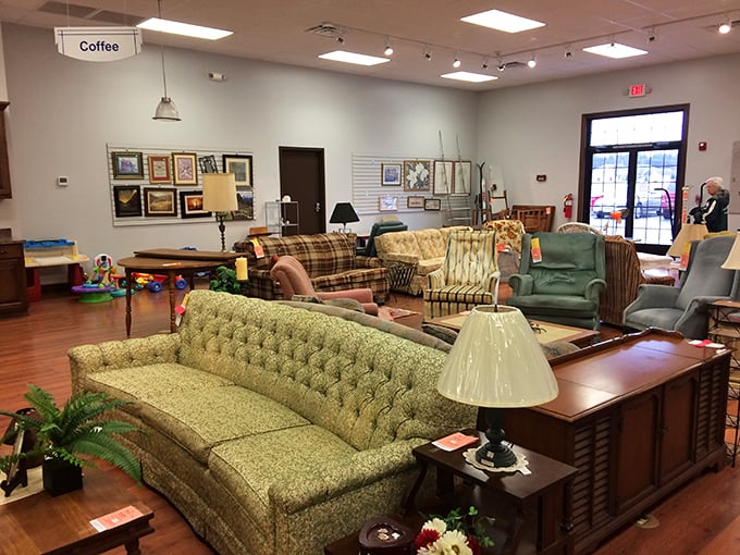A living room showroom that could double as a time machine. That tufted sofa has definitely seen some "I Love Lucy" episodes.