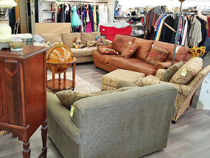 Living room islands where couches and armchairs gather, waiting for someone new to sink into their cushiony embrace.