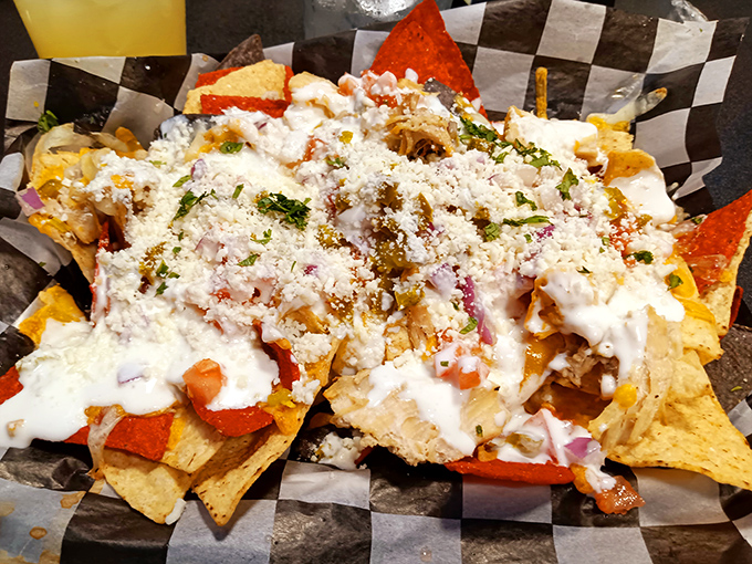 Nachos that require a strategy to eat. Like chess, but delicious, and with significantly more cheese.