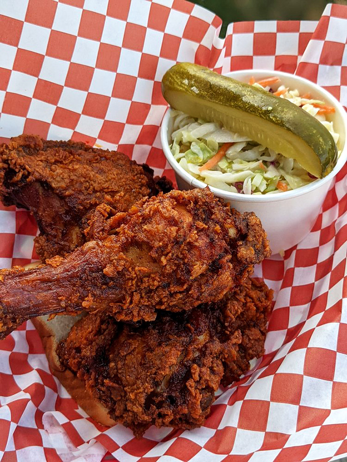 The spicy chicken's deep russet color serves as nature's warning system: proceed with caution, but know the flavor is worth the heat.