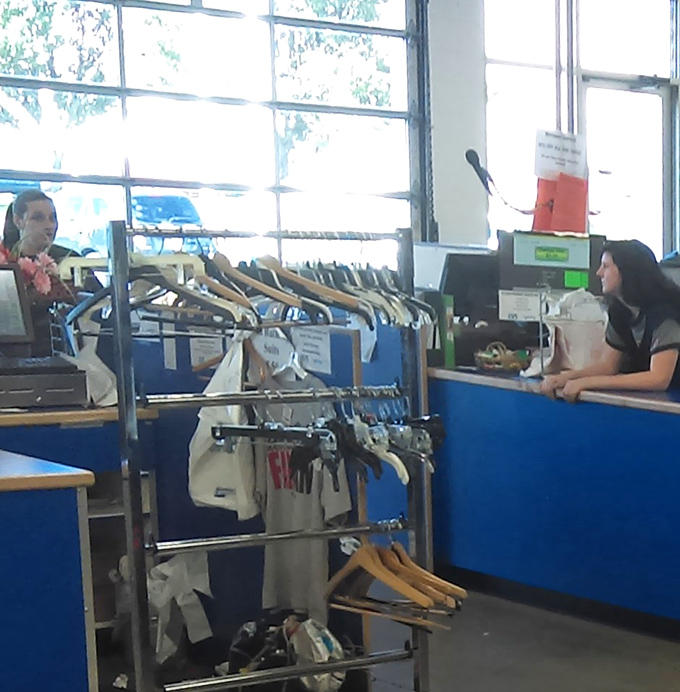 The checkout area: where treasures officially change hands and staff members transform donations into community support. Retail therapy with a conscience.