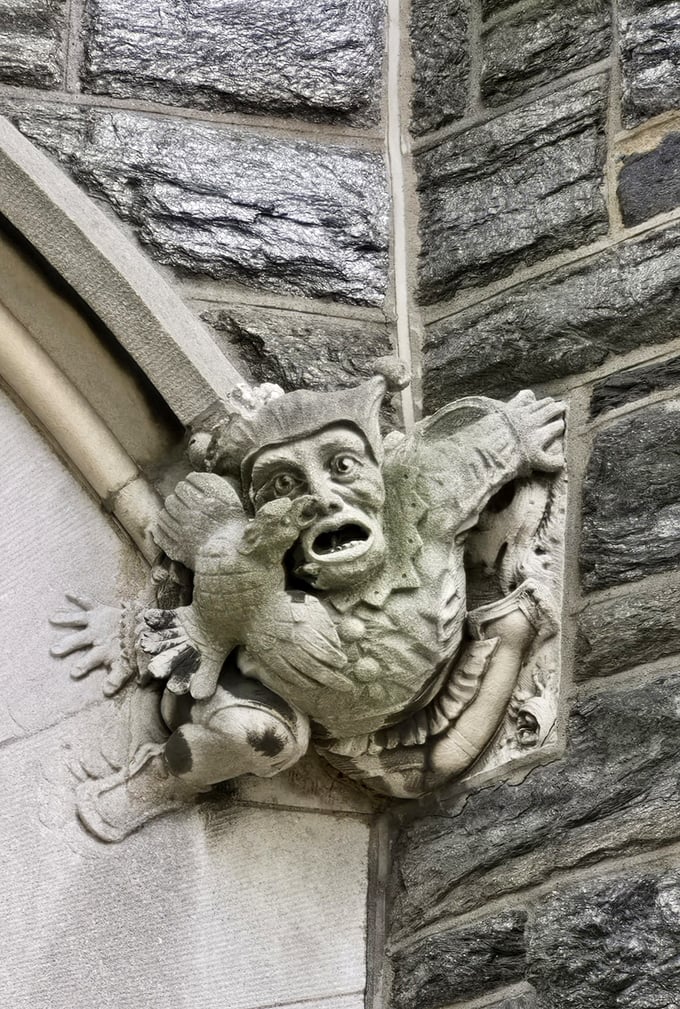This gargoyle isn't just decorative—he's having an existential crisis. "Am I guarding this castle or just stuck in this wall forever?" Poor fellow.