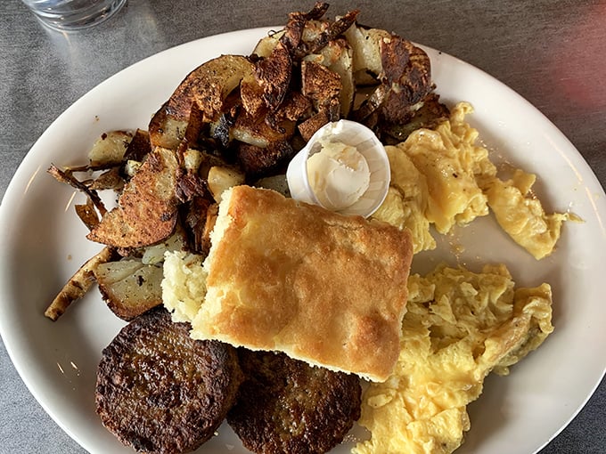 Breakfast of champions: crispy skillet potatoes, eggs, and a biscuit that would make your grandmother both jealous and proud.