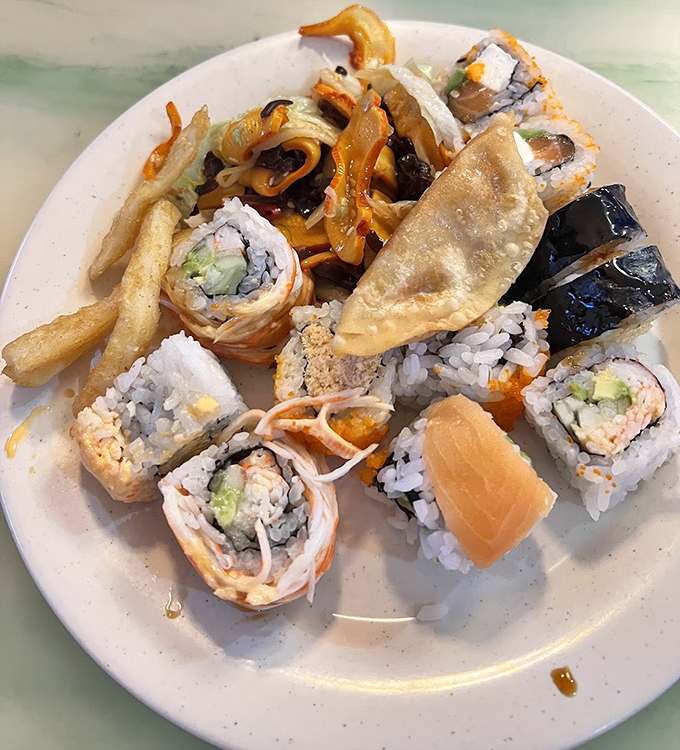 A sushi sampler that spans the rainbow. Each piece a tiny work of art that disappears in seconds.