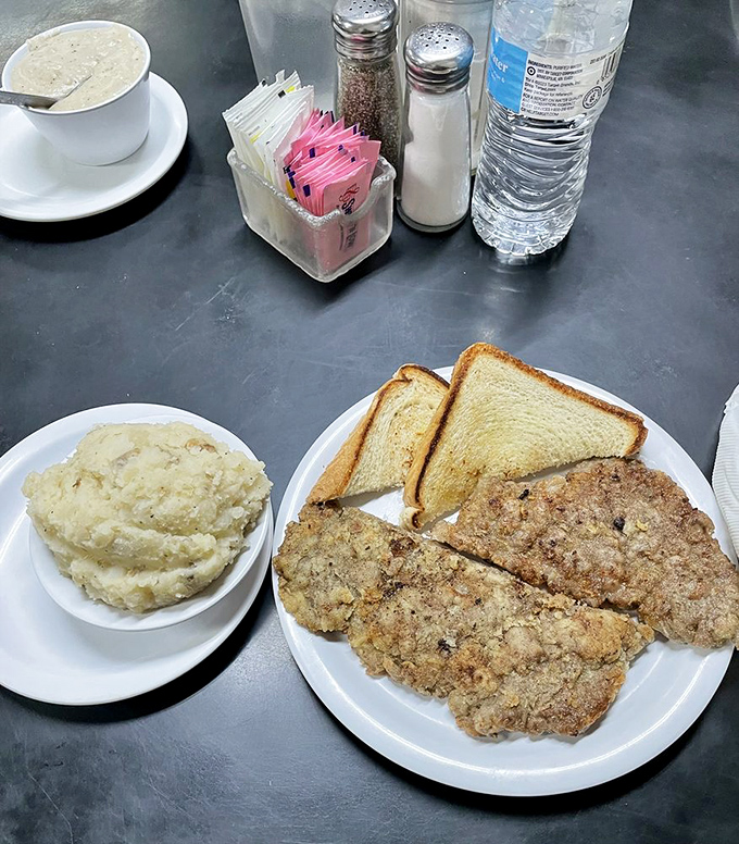 Simple pleasures: perfectly golden Texas toast alongside a chicken fried steak that's been tenderized with what must be equal parts skill and love.