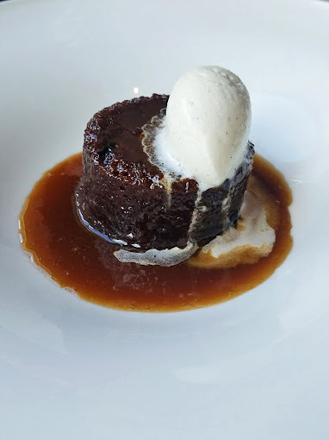 Sticky toffee pudding that doesn't just satisfy your sweet tooth&mdash;it throws a party for it. That vanilla ice cream is melting almost as fast as my resolve.