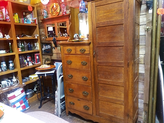 This vintage cabinet stands ready to house your collections, a testament to craftsmanship when furniture lasted lifetimes.
