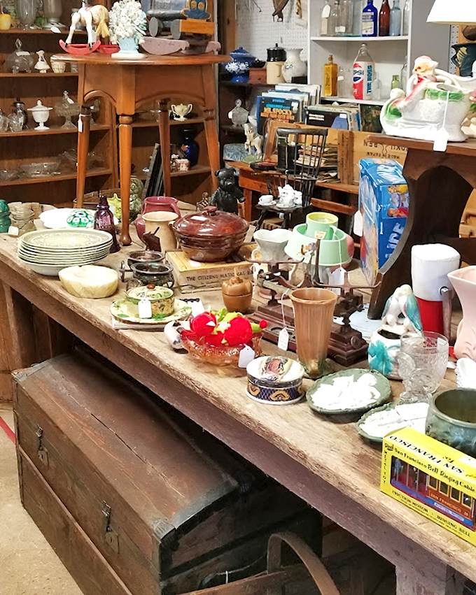 Every shelf tells a story in this carefully curated corner where your grandmother's favorite dishes might be waiting to come home with you.