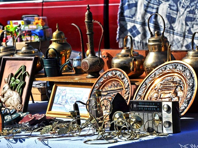 Time capsules for sale! These brass teapots, decorative plates, and vintage radios aren't just objects&mdash;they're portals to grandma's kitchen circa 1965.