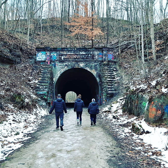 Brave souls venture toward the darkness, perhaps hoping to catch a glimpse of the Moonville Engineer's ghostly lantern.