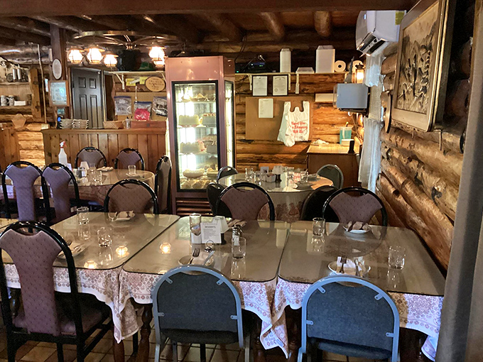Log cabin meets dining hall in this cozy space where every table feels like you're eating in someone's particularly well-decorated hunting lodge.