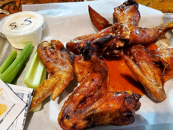 Wings that make you understand why humans evolved taste buds. Served with cooling celery sticks for when your bravado exceeds your heat tolerance.