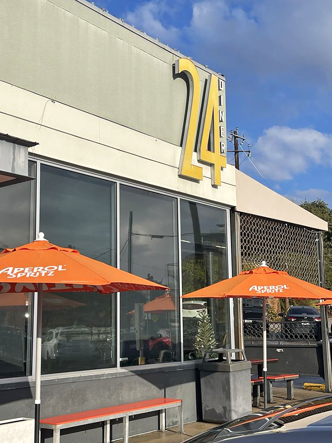 That orange "24" shines like a lighthouse for Austin's night owls and early birds alike.