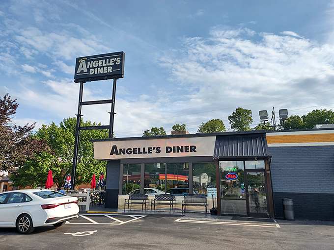Angelle's Diner stands proud against the sky, a breakfast fortress where maple syrup flows like liquid gold.
