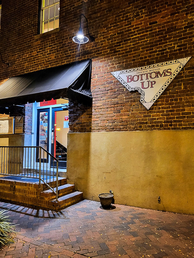 That triangular sign points the way to pizza nirvana. Bottoms Up's historic brick building has survived floods and fed generations.