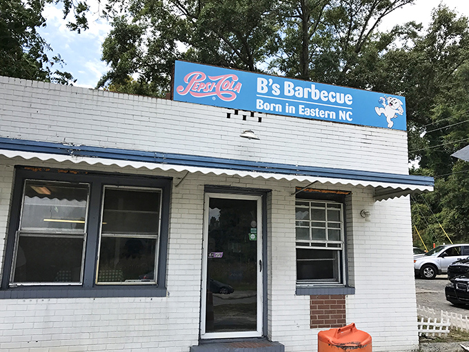 B's Barbecue's simple white building with its Pepsi-blue trim is the barbecue equivalent of a speakeasy. No phone, no website—just legendary pork.