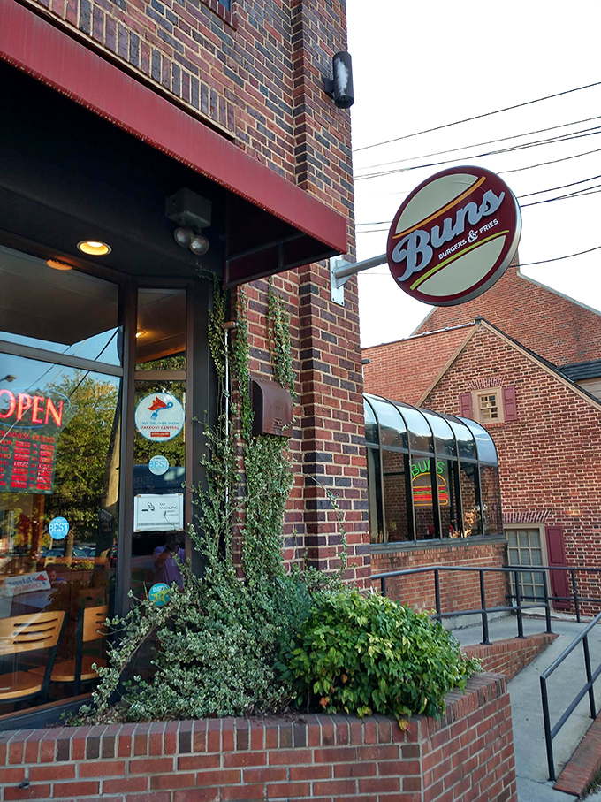 Buns' brick facade and classic sign offer a sophisticated take on the burger joint, promising quality without pretension.