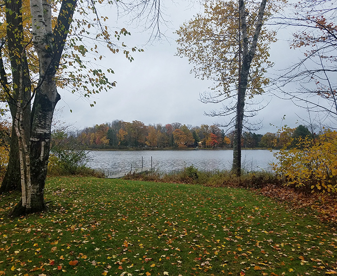 Peaceful autumn colors surround the calm waters in Cable, offering a perfect place to relax, enjoy nature, and recharge outdoors.