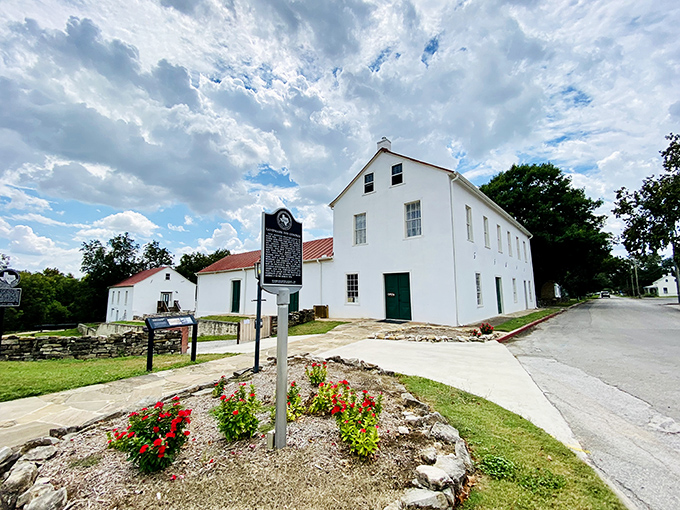 Castroville's white building stands like a freshly pressed Sunday shirt against that dramatic Texas sky. Picture-perfect!