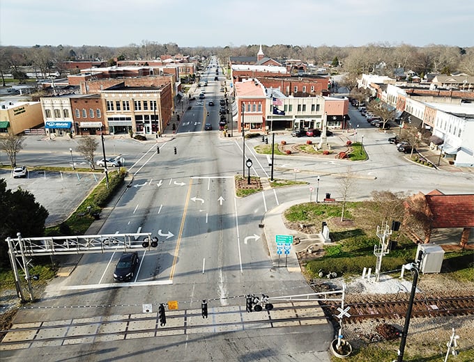 Clinton's downtown intersection proves that four-way stops can lead to affordable living in all directions.