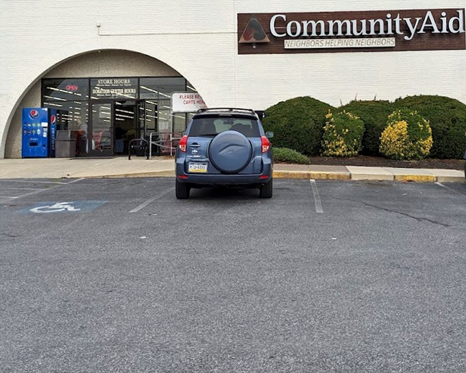 Community Aid's distinctive arched entrance isn't just architectural flair&mdash;it's a gateway to guilt-free retail therapy.