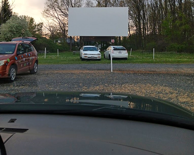 Motorcycles line up at the edge of the field – even road warriors appreciate the magic of outdoor cinema.