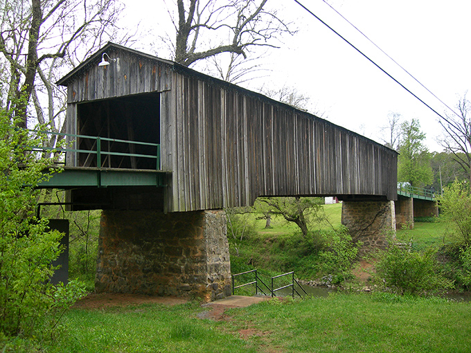 This covered bridge has stories older than your grandpa's fishing tales. Euharlee's wooden wonder stands sturdy against time.