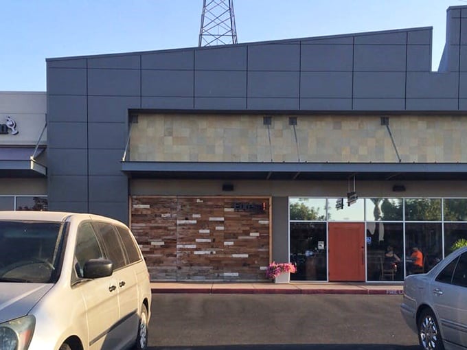 Eureka's sleek exterior hints at the culinary creativity happening inside &ndash; where burger innovation meets craft cocktail sophistication.