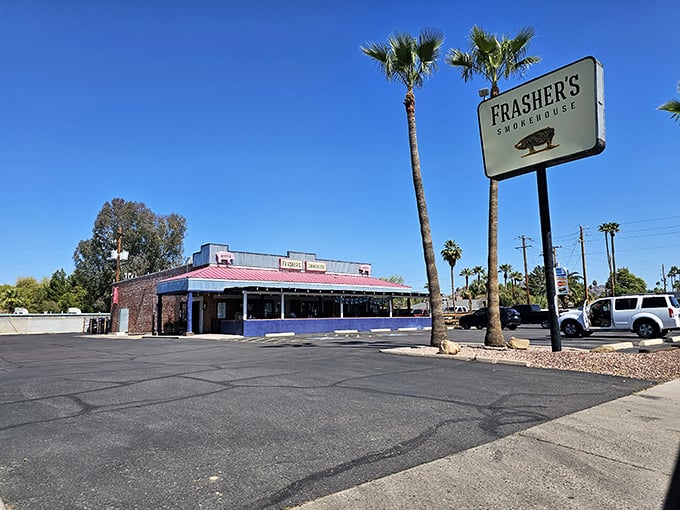 Palm trees stand tall outside Frasher's Smokehouse &ndash; nature's exclamation points announcing "Great BBQ Here!"