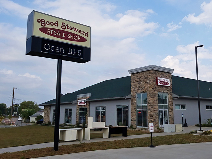 Good Steward's modern stone facade and welcoming sign invite curious shoppers inside. A thrift cathedral where bargain prayers are frequently answered.