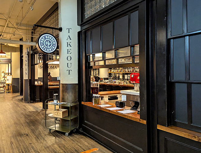 H&F Burger's sophisticated takeout window &ndash; where burger artistry meets urban convenience in Atlanta's bustling food scene.