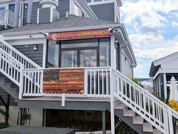 Harris Crab House stands proudly on Kent Narrows, a white sentinel guarding generations of seafood secrets.
