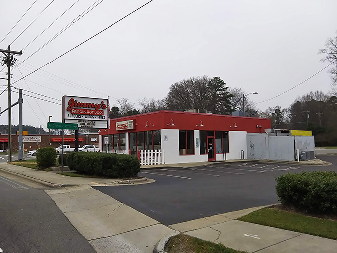 Jimmy's Famous Hot Dogs' cherry-red building with its picket fence looks like it was plucked straight from a Norman Rockwell painting.