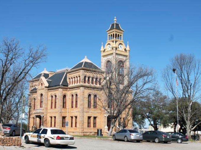 Llano's courthouse square feels frozen in time, where modern cars park beside buildings that have witnessed generations.