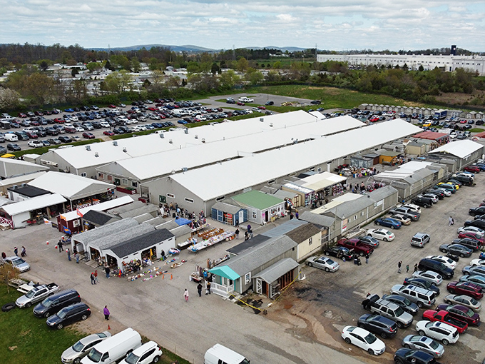 Bargain hunting with a view! Morning Sun Marketplace's massive complex spreads out beneath blue skies, promising treasures in every building.