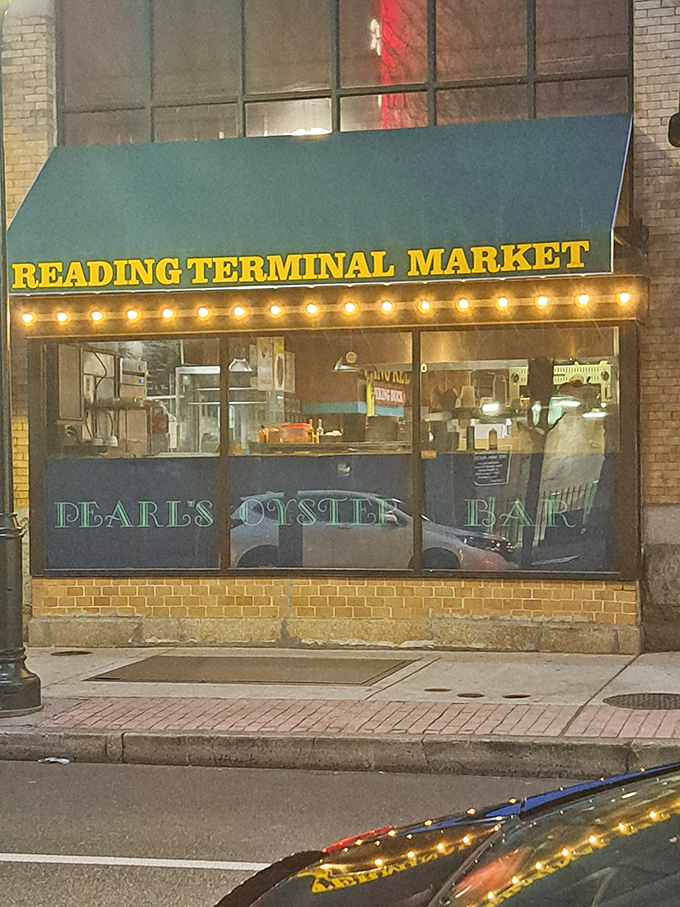 Pearl's Oyster Bar (night view): "Those glowing lights aren't just pretty&mdash;they're illuminating one of Reading Terminal Market's greatest treasures!"