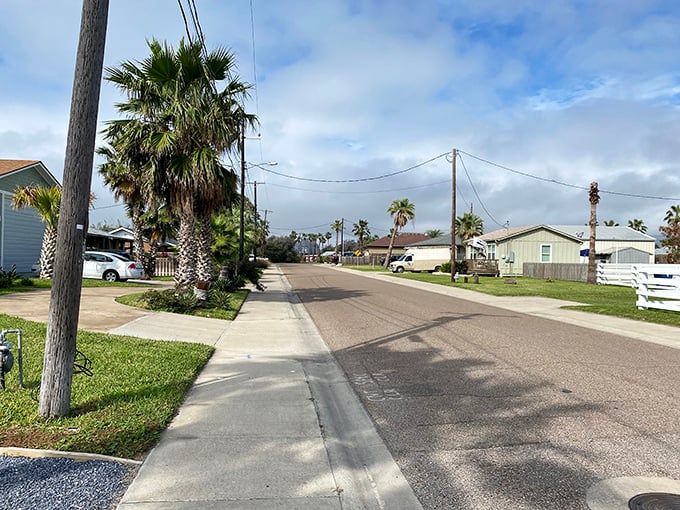 Port Aransas neighborhoods offer coastal living where palm trees sway and mortgage payments stay surprisingly reasonable.