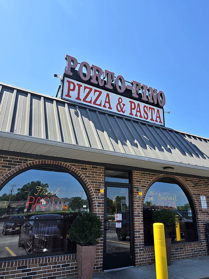Porto-Fino's bold signage makes no secret of its specialties. Those arched windows frame pizza dreams waiting to come true.