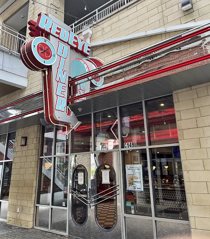 RedEye Diner's retro-modern sign pops against the urban landscape &ndash; a beacon for the breakfast-obsessed in Charlotte.