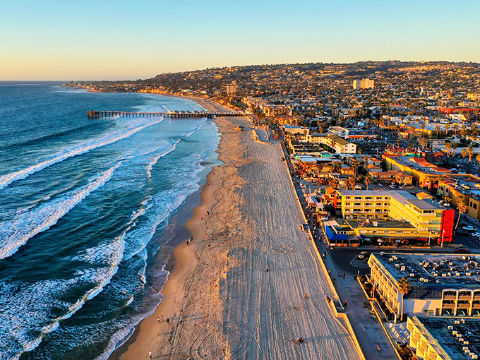 Golden hour bathes the endless coastline in light that photographers only dream about.
