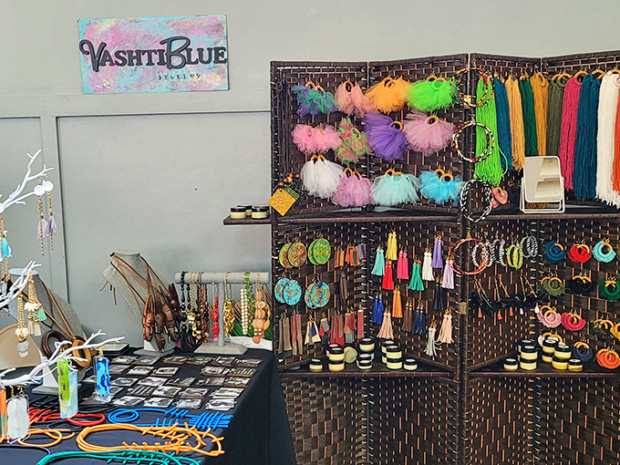 The Black Mall showcases colorful handcrafted accessories with artistic flair. Wearable art that makes a statement!