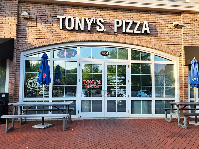 Brick, glass, and the promise of perfect pizza. Tony's elegant arched windows frame a timeless approach to New York-style pies.