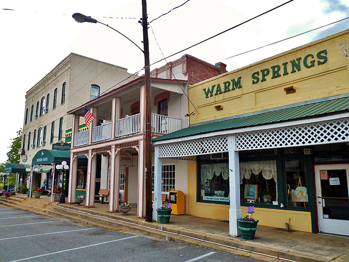 Warm Springs' main street looks frozen in time, with the iconic yellow storefront welcoming visitors just as it did when FDR came seeking healing waters.