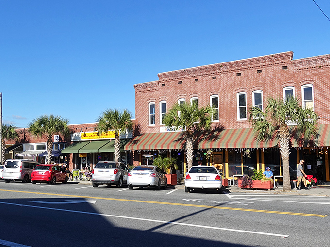 Coastal elegance meets working waterfront charm where shrimp boats and Victorian homes share the same horizon.