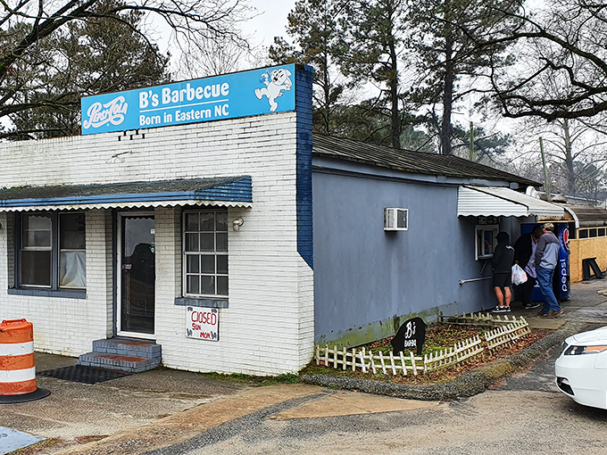 The line forming outside B's tells you everything—this no-frills joint sells out daily for good reason. When barbecue is this good, who needs fancy signage?