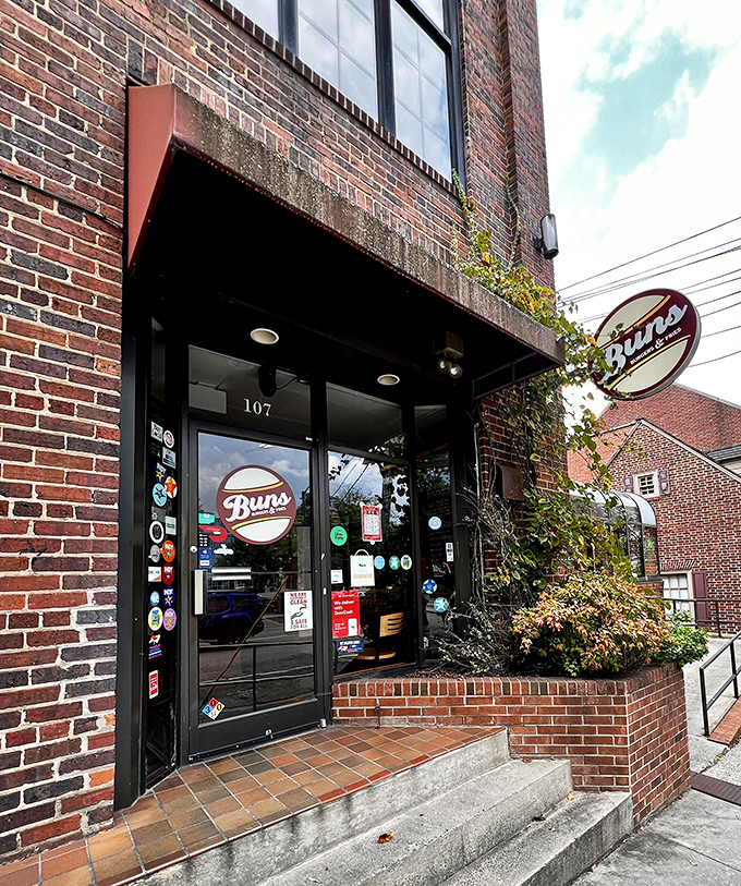 The entrance to Buns features a door decorated with stickers from loyal fans who've made this Chapel Hill spot a regular haunt.