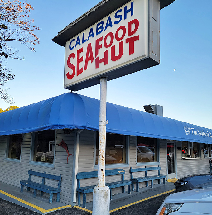That faded sign has pointed the way to seafood happiness for generations of families seeking the original "Calabash-style" experience.