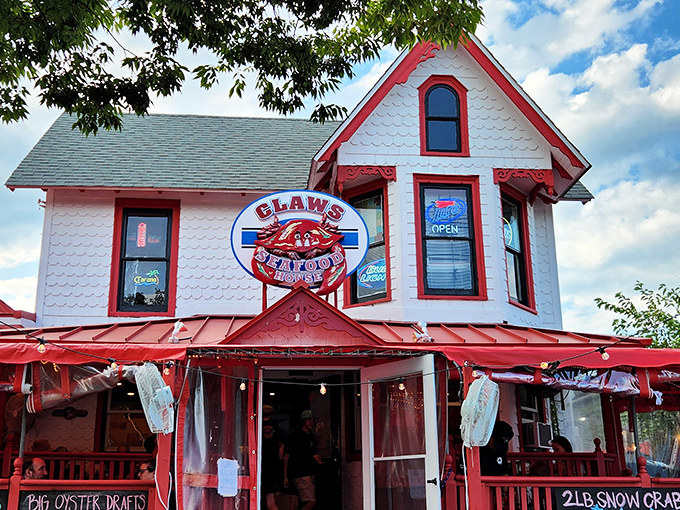 The charming porch at Claws Seafood House invites you to sit a spell and crack some crabs &ndash; coastal comfort at its finest.