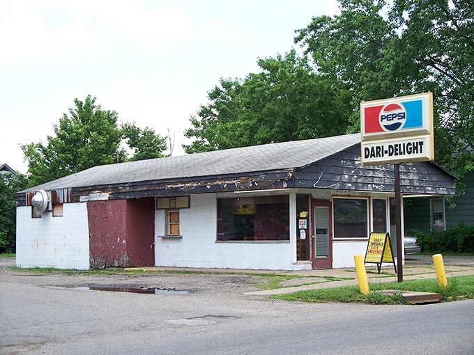 The Dari-Delight stands as a monument to summer memories—where ice cream cones drip down sticky fingers and first dates share milkshakes.