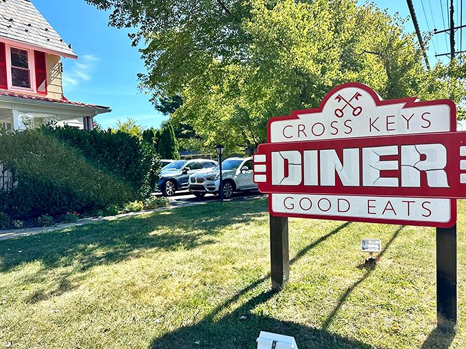 When a sign promises "GOOD EATS," it better deliver. Spoiler alert: this red-and-white charmer absolutely does.